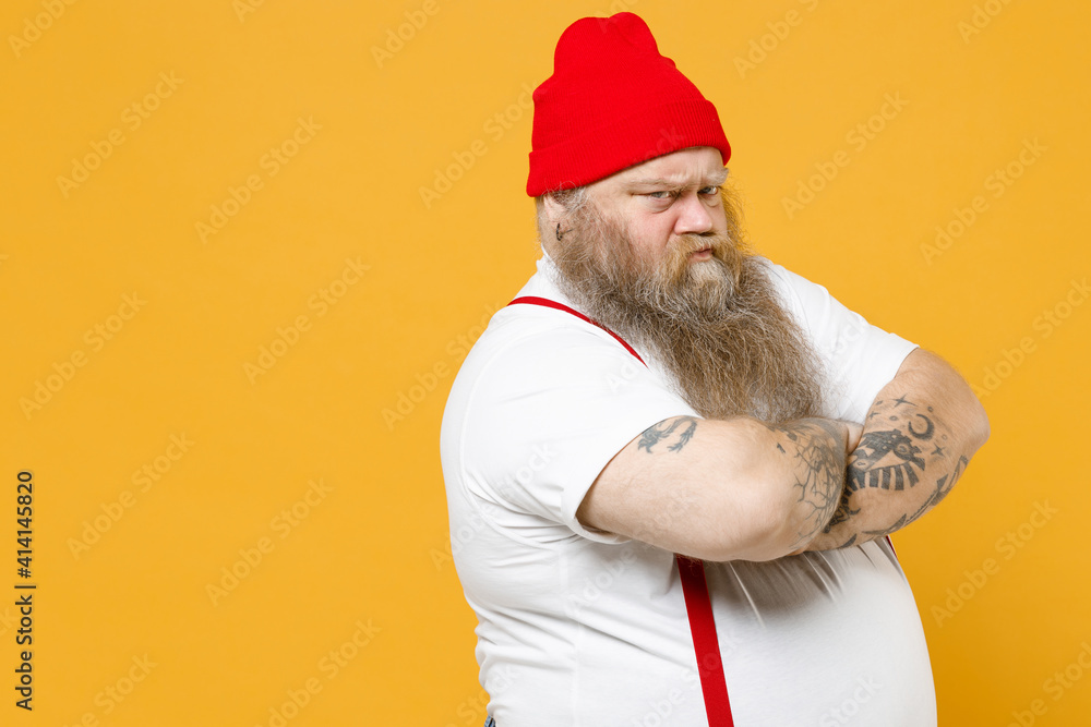 Fat pudge obese chubby overweight tattooed bearded frowning man has big ...