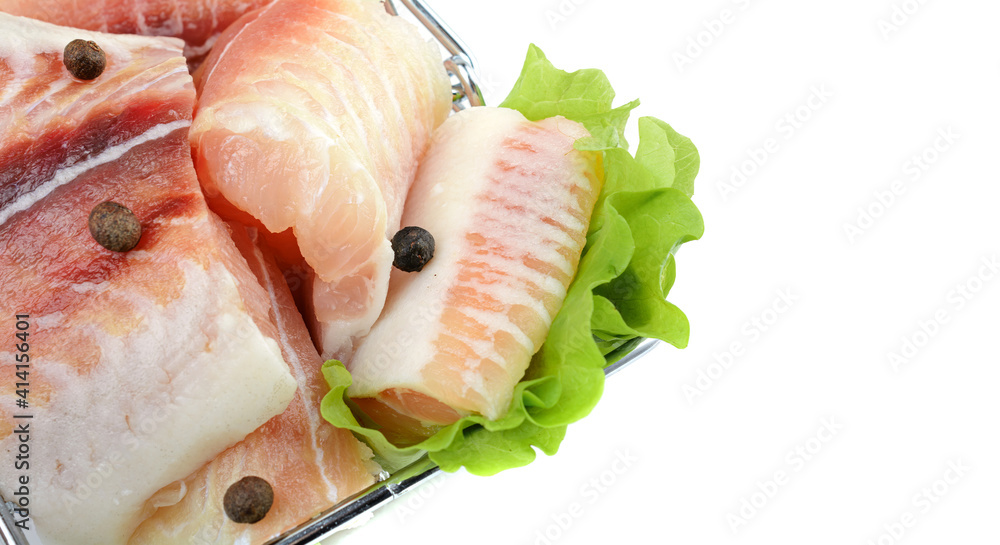 Pangasius fish fillet, sliced into pieces in the shopping basket ...