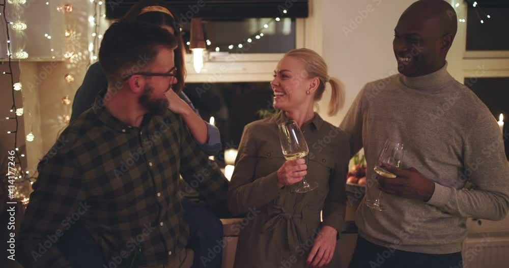 Laughing couples talking over drinks Stock Video | Adobe Stock