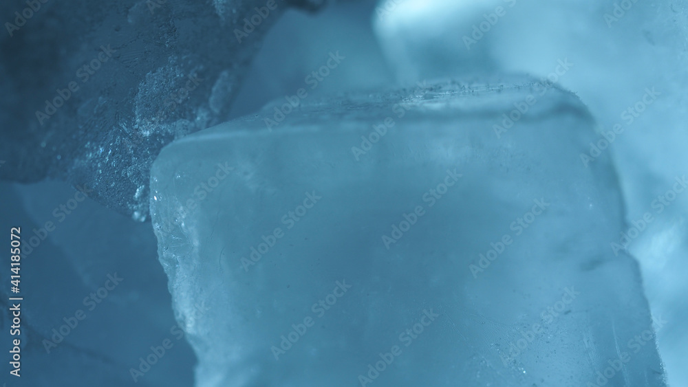 Abstract extreme macro closeup photo of frozen ice cubes as seen inside ...