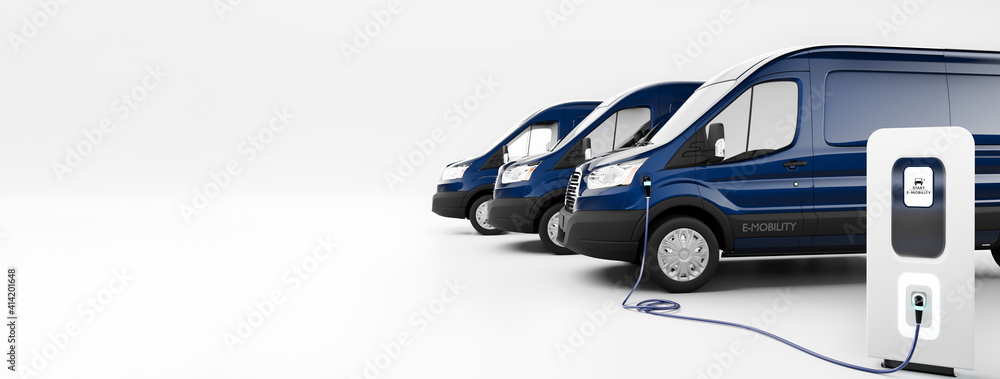 E-Mobility and ecology. Charging an electric transporter in white ...