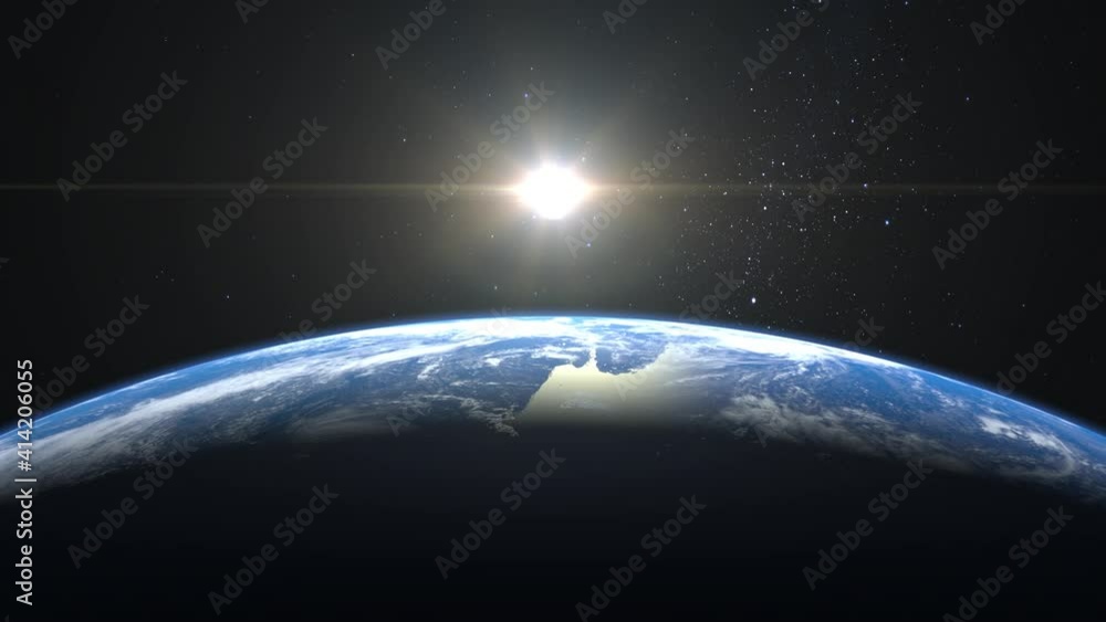 Sunrise over the Earth. View from space. The camera moves away ...