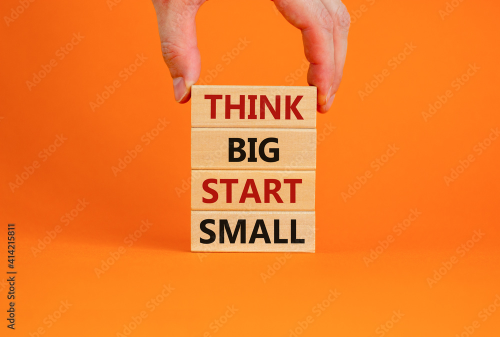 Think big start small symbol. Concept words 'Think big start small' on ...