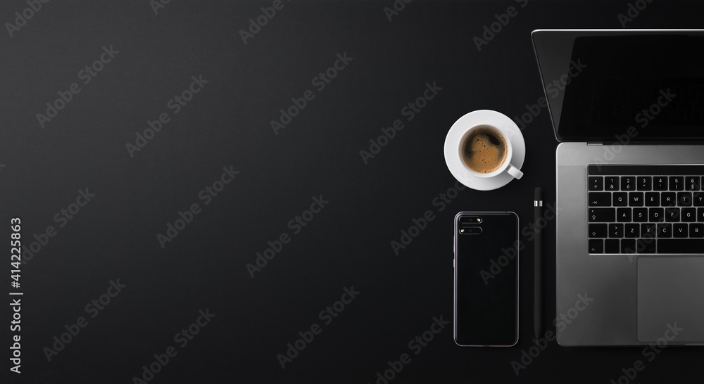 Flat lay top view office desk working space with laptop on black ...