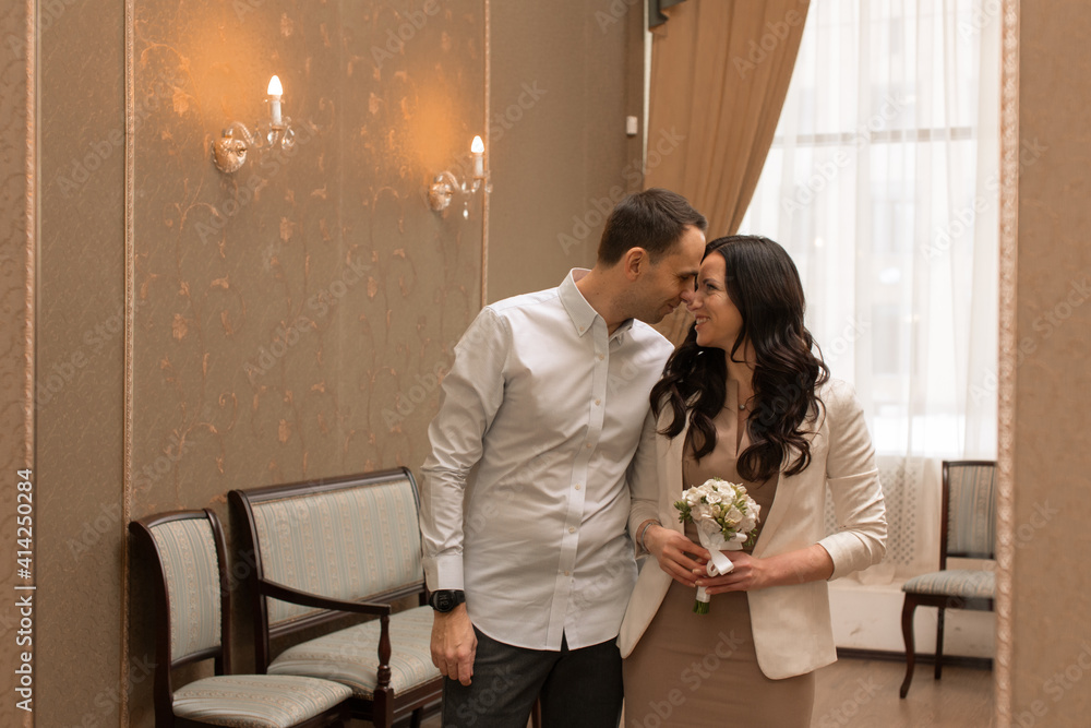 Beautiful and happy newlyweds marry each other and get married. New ...