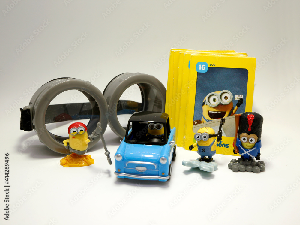Objects and toys from Minions the movie. Minion card and glasses game ...