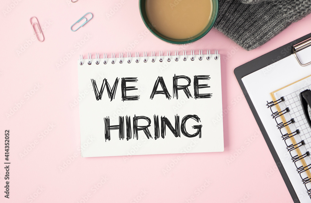text on notepad with text We are hiring. Concept of new job hiring ...