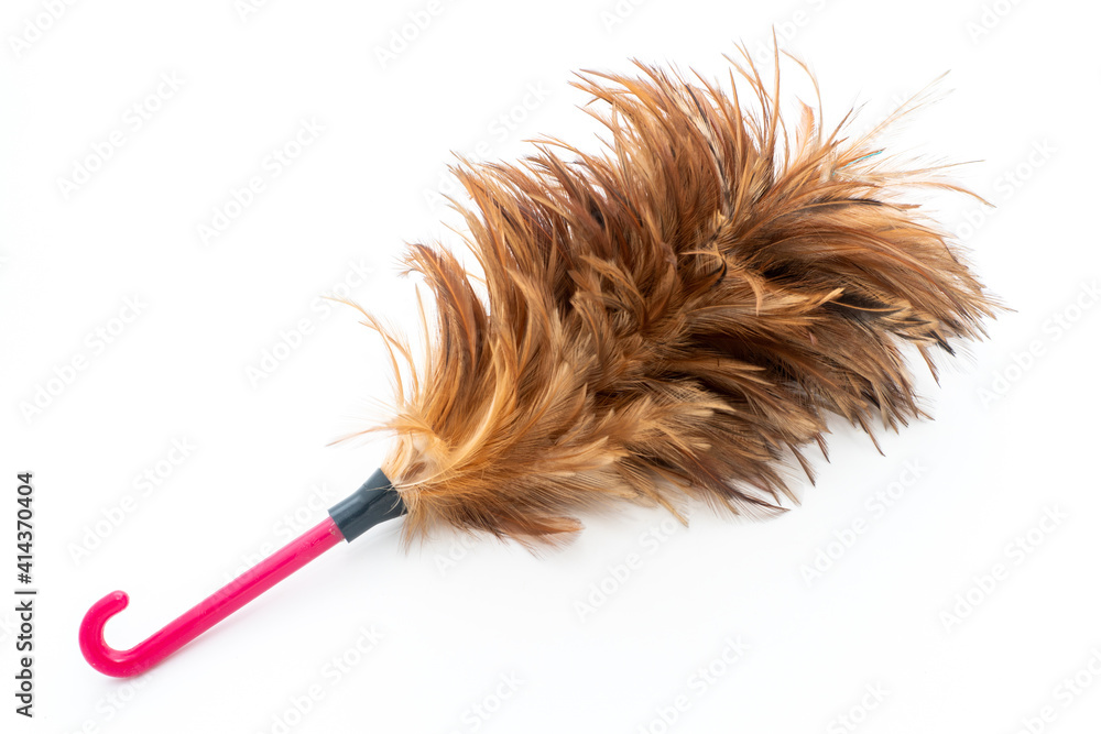 Feather duster on a white background, A feather duster is an implement ...