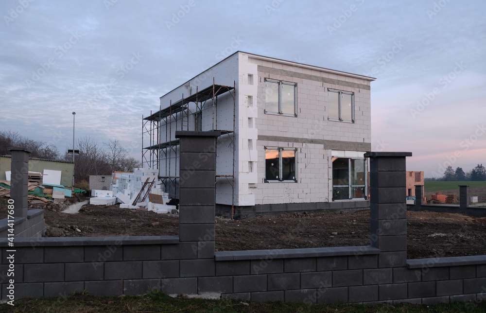 View of an unfinished two-storey house, typical modern suburban house ...