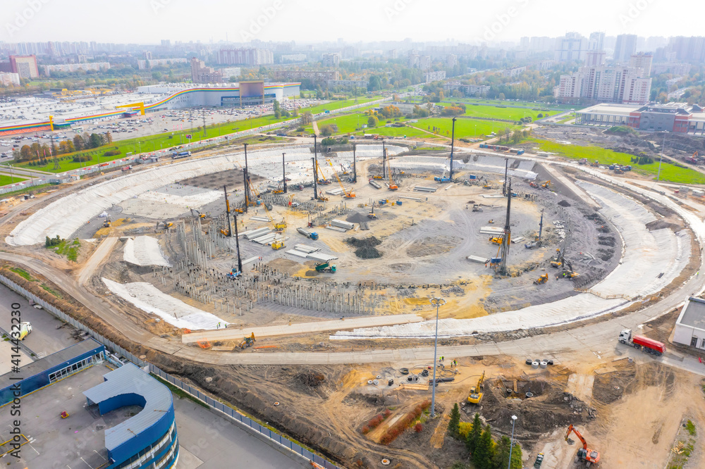 Construction of a stadium, exhibition complex, arena. Heavy machines ...