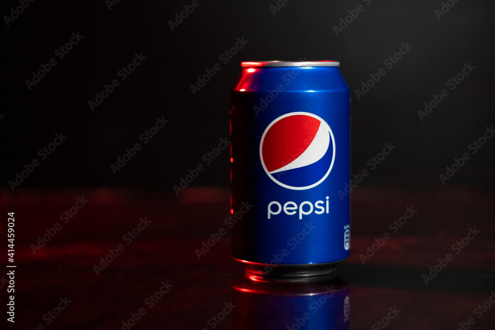 Pepsi soda can with water drops splashes on black background editorial ...