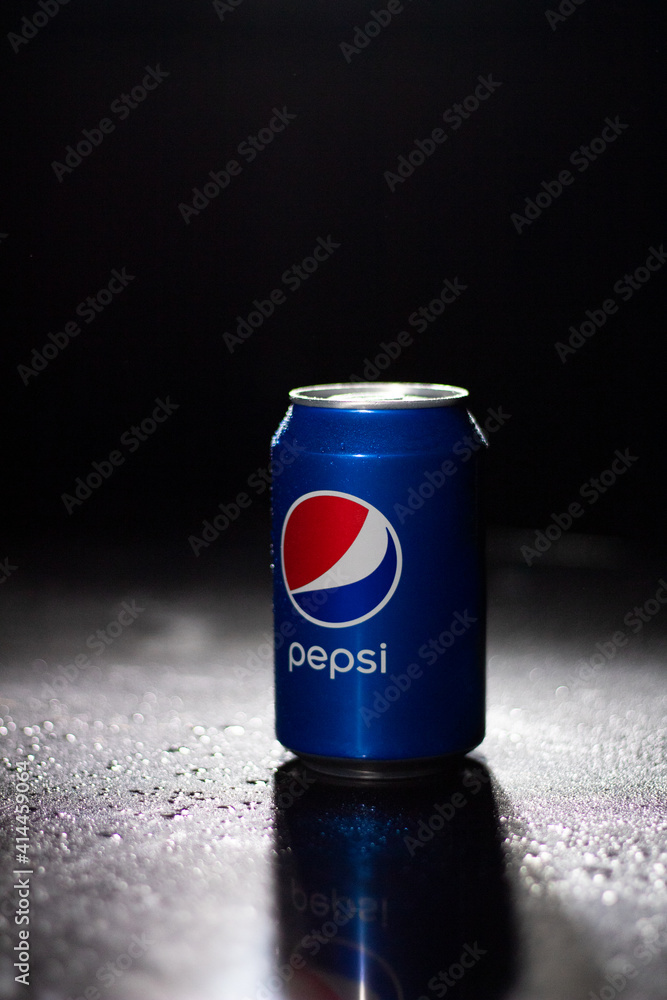 Pepsi soda can with water drops splashes on black background editorial ...
