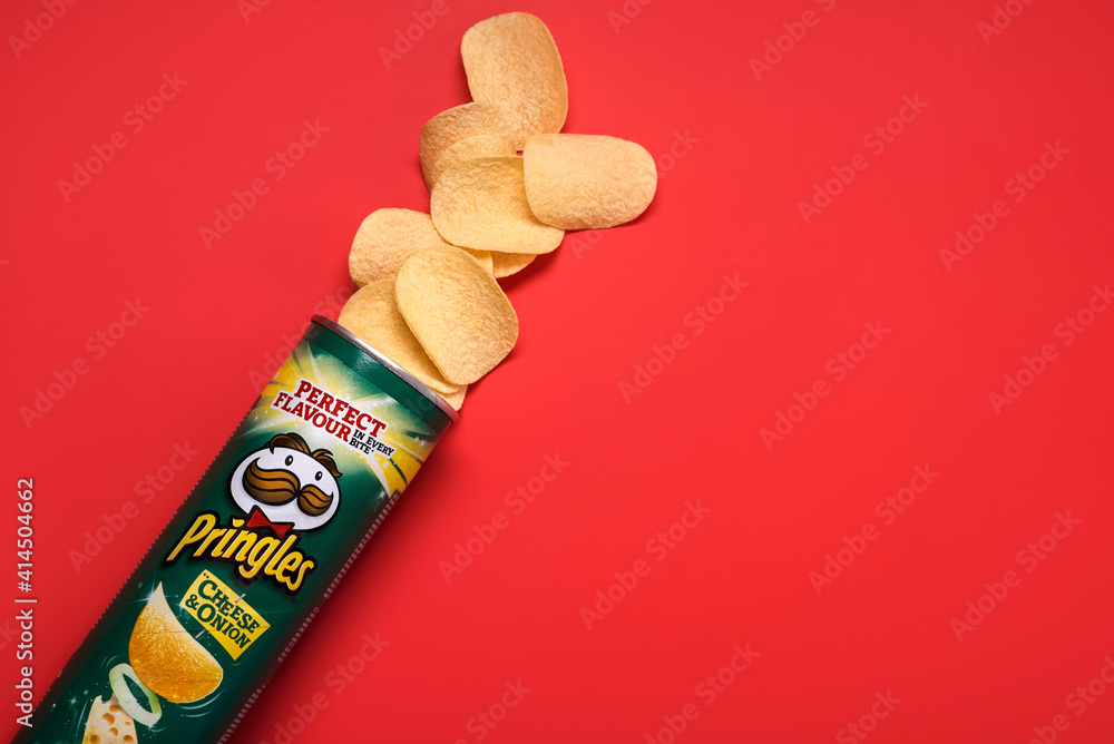 Pringles cheese and onion.Cardboard tube can with Pringles potato chips ...