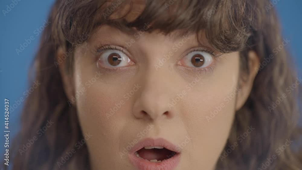 The macro of the human eye - confusion or shock, looking away.Close-up ...