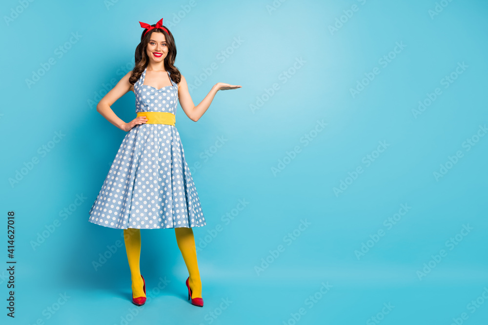 Full size photo positive cool girl promoter hold hand recommend suggest ...