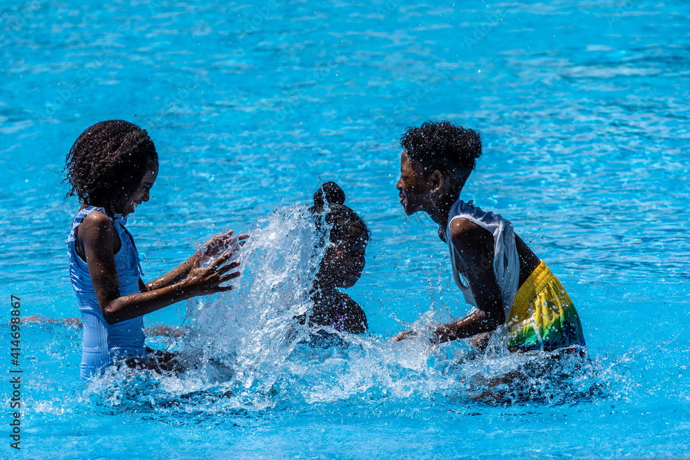 Kids playing together in waterpark Stock Photo | Adobe Stock
