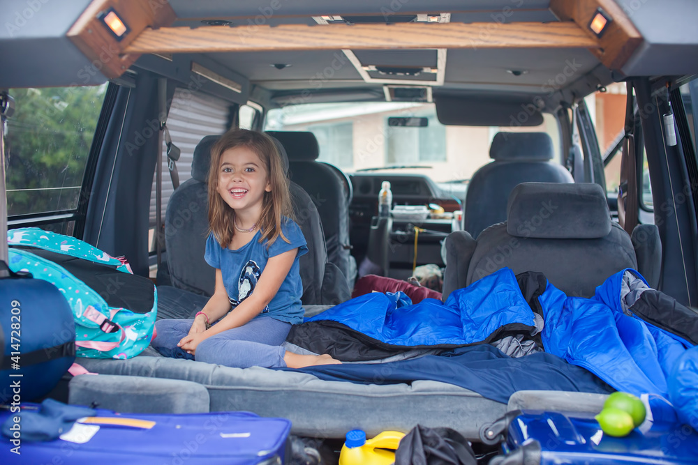 young girl sleeping in a car Stock Photo | Adobe Stock