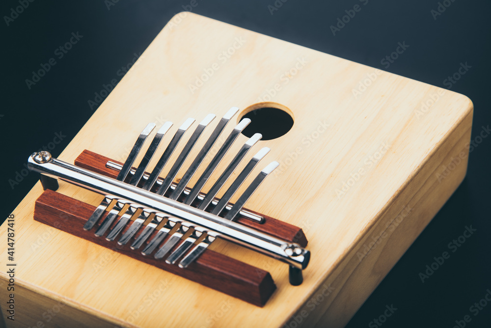 vintage acoustic Kalimba percussion music instrument, made from wooden ...