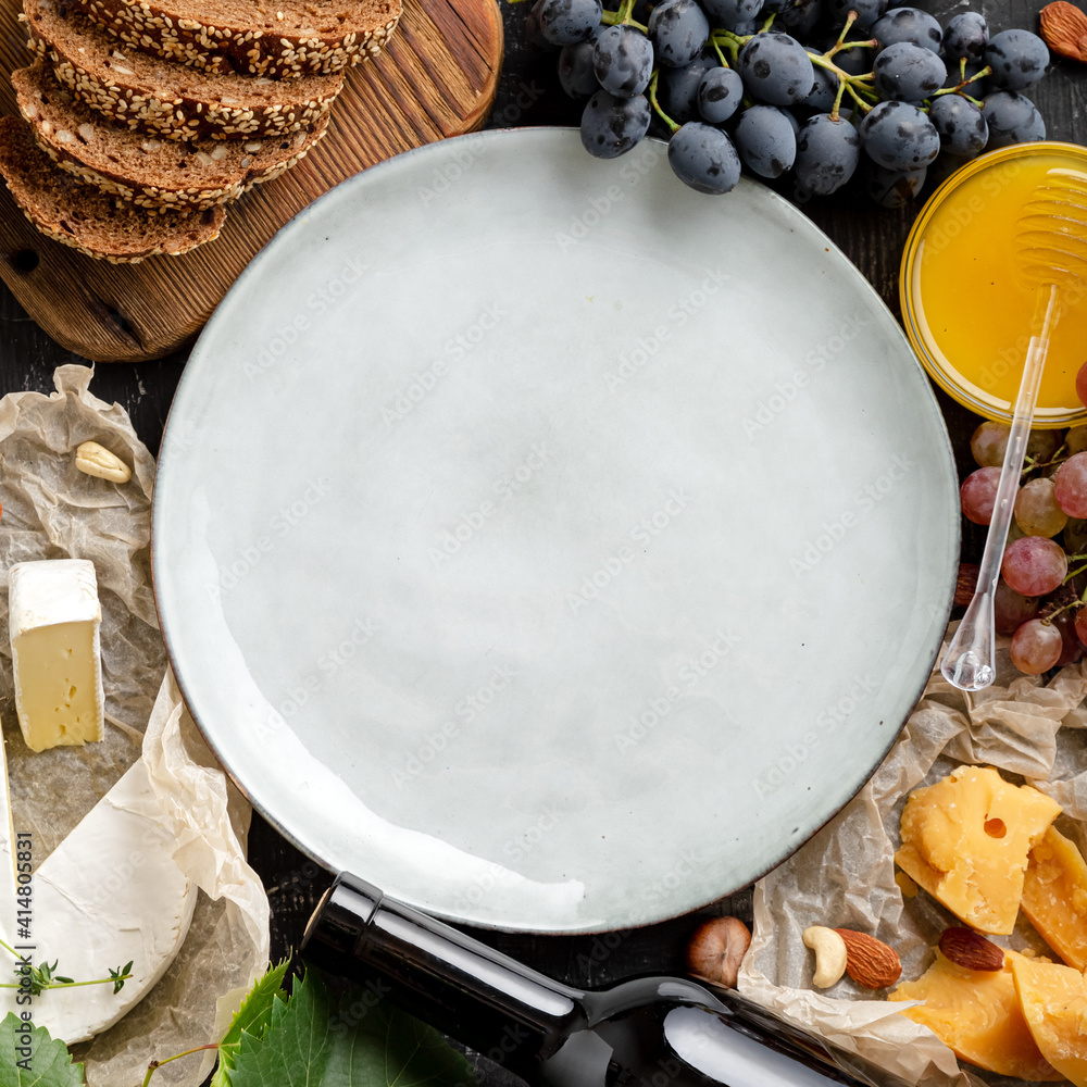 Mock up plate on full of food various table. Round Plate blank or frame ...
