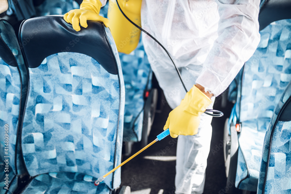 Professional chemical cleaning of bus seats. Bus disinfection. Stock ...