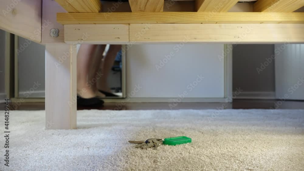 Adult woman (age 30-40) rushing to work searching for a lost set of ...