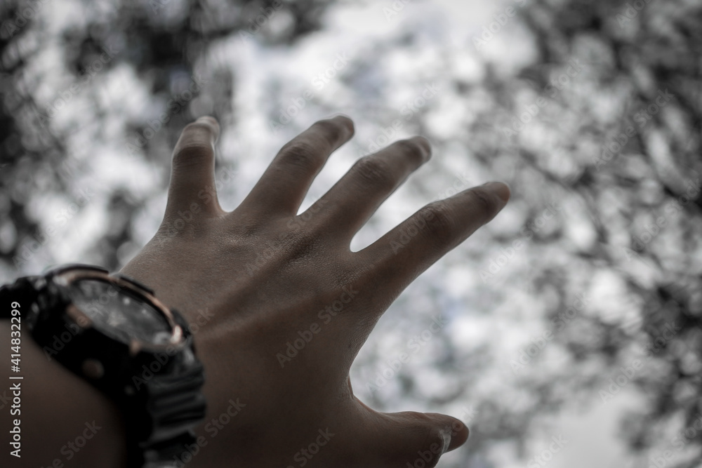 Hand of a city man in the forest. a victim of a violent crime murder ...