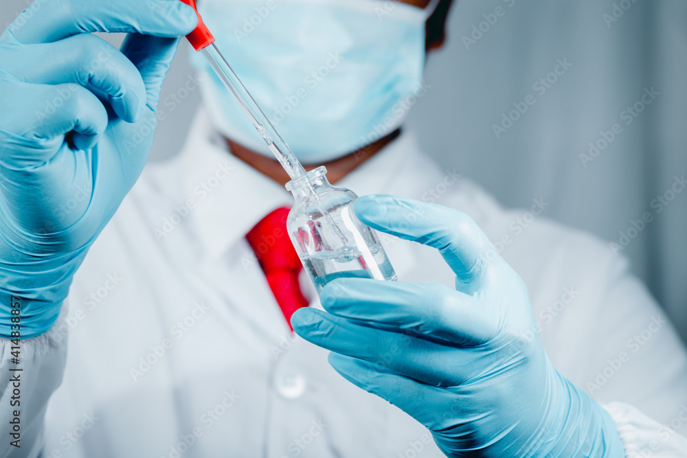 Doctor or scientist wearing antivirus clothing In the laboratory ...