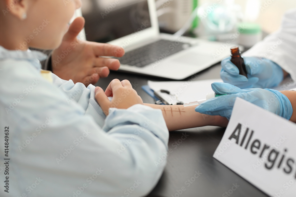 Little girl undergoing allergen skin test in clinic Stock Photo | Adobe ...