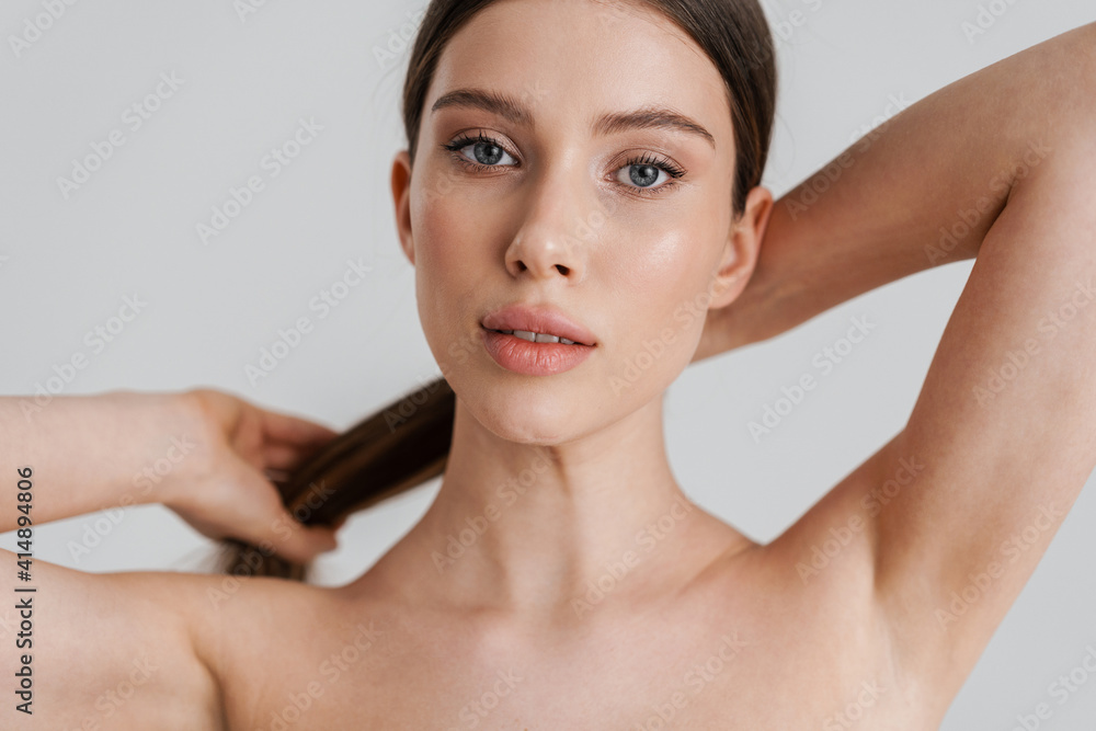 Beautiful shirtless girl posing and looking at camera Stock Photo ...
