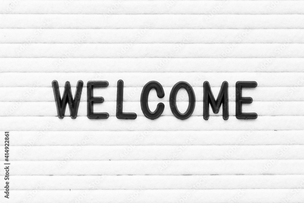 Black color letter in word welcome on white felt board background Stock ...