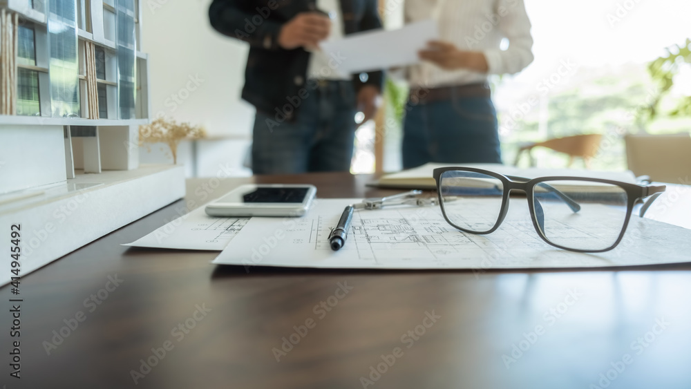 Engineer or architect teamwork working on construction project with ...