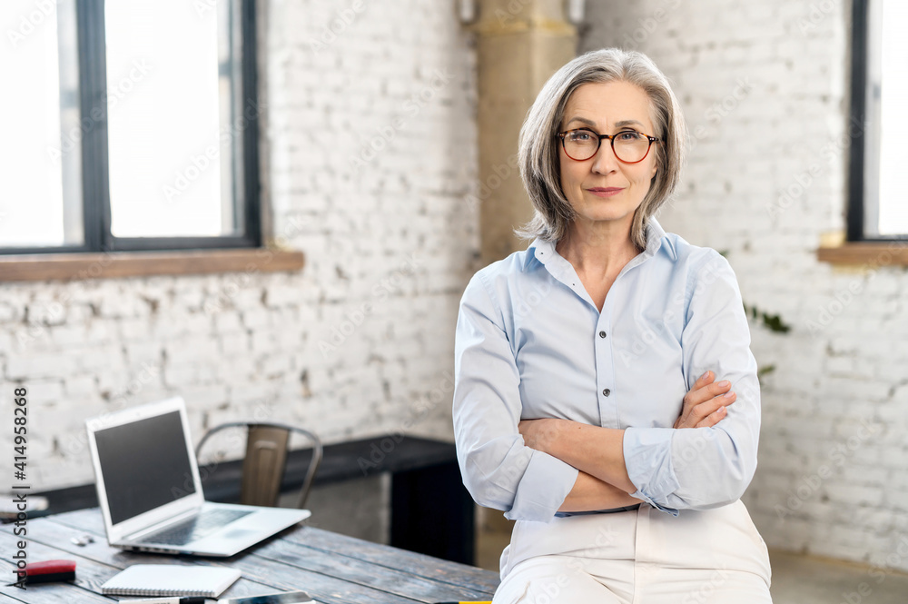 Stockfoto Serious and strict old senior business woman wearing smart ...
