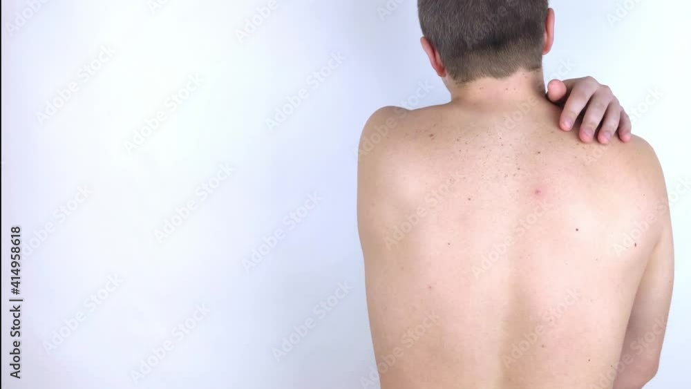 A man at the doctor's appointment with back pain. Treatment of spinal ...