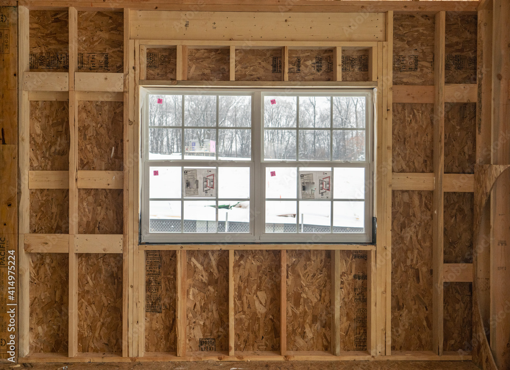 Interior view of skeleton window and wall structure at a new American ...