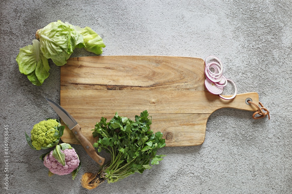 Food cooking background with cutting board, cauliflower, bunch of ...