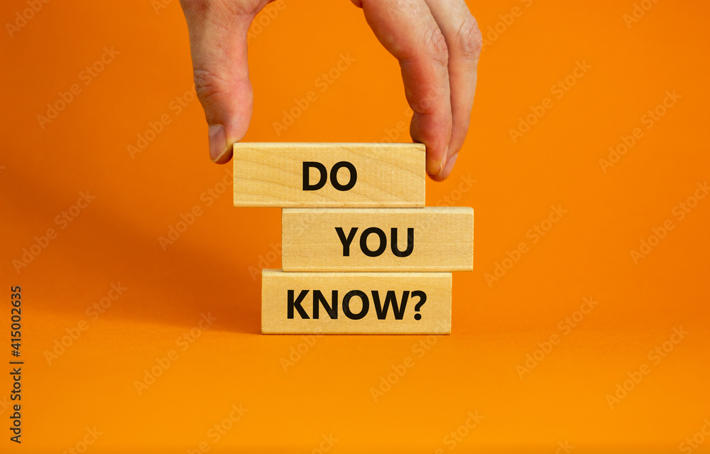 Do you know symbol. Businessman hand. Wooden blocks with words 'do you ...