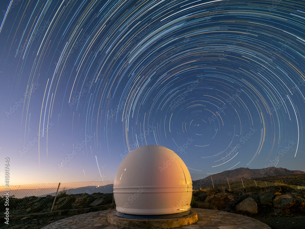Star trails over an observatory on Jebel Shams, the highest mountain of ...
