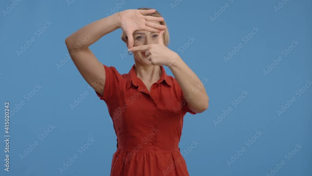 Making a frame with fingers.Focus movement from the female hand to the ...