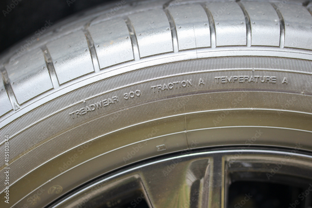 Writing on the side of a tire Stock Photo | Adobe Stock