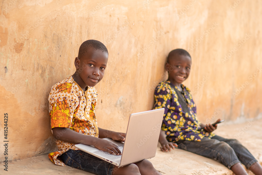 african kids engaging with technology Stock Photo | Adobe Stock