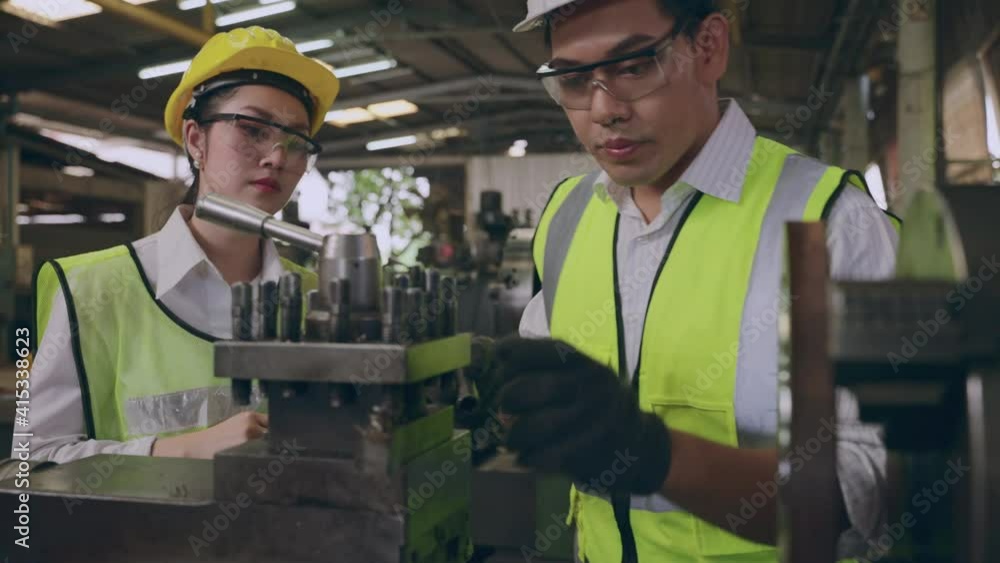 Professional mechanical engineer and operation team wearing uniform ...