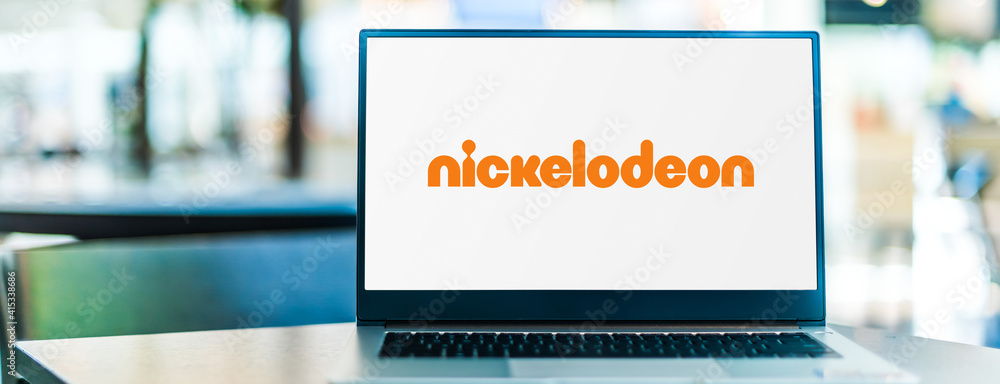 Laptop computer displaying logo of Nickelodeon Stock Photo | Adobe Stock