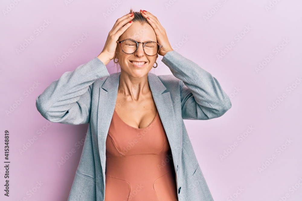 Beautiful caucasian woman wearing business jacket and glasses suffering ...