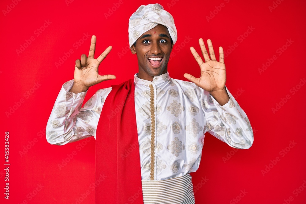 Handsome indian man wearing tradition sherwani saree clothes showing ...