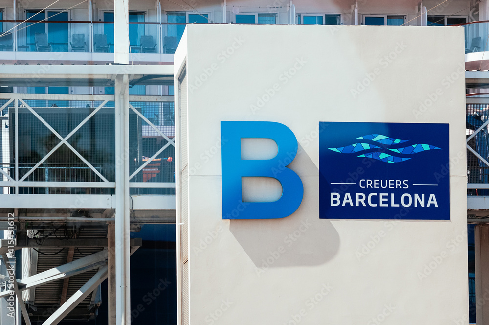 Big modern sign of cruise Terminal B on the facade of the entrance gate ...
