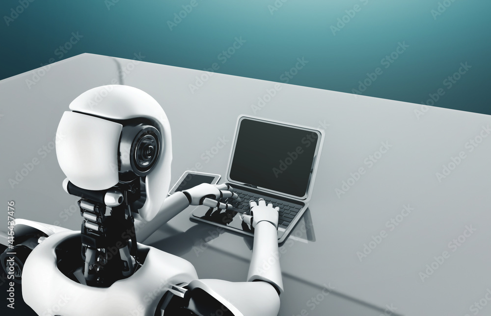 Robot humanoid use laptop and sit at table in future office while using ...