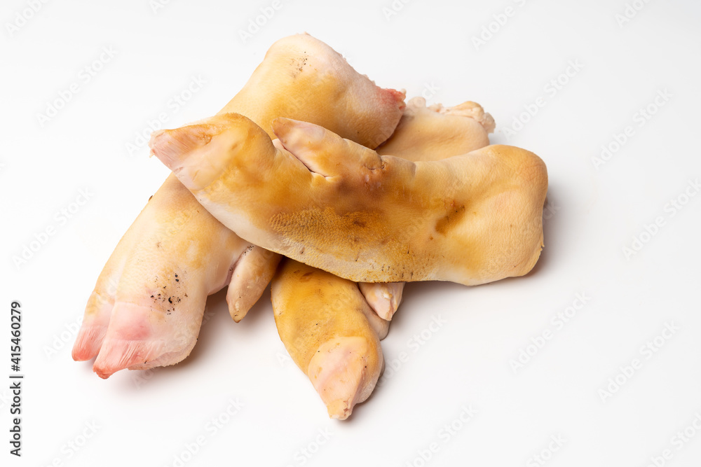 Half-raw pig's feet on a pure white background Stock Photo | Adobe Stock