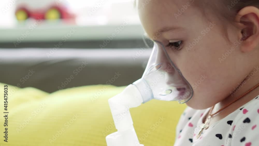 close up Caucasian 3-4 years minor preschool girl kid in the mask of an ...