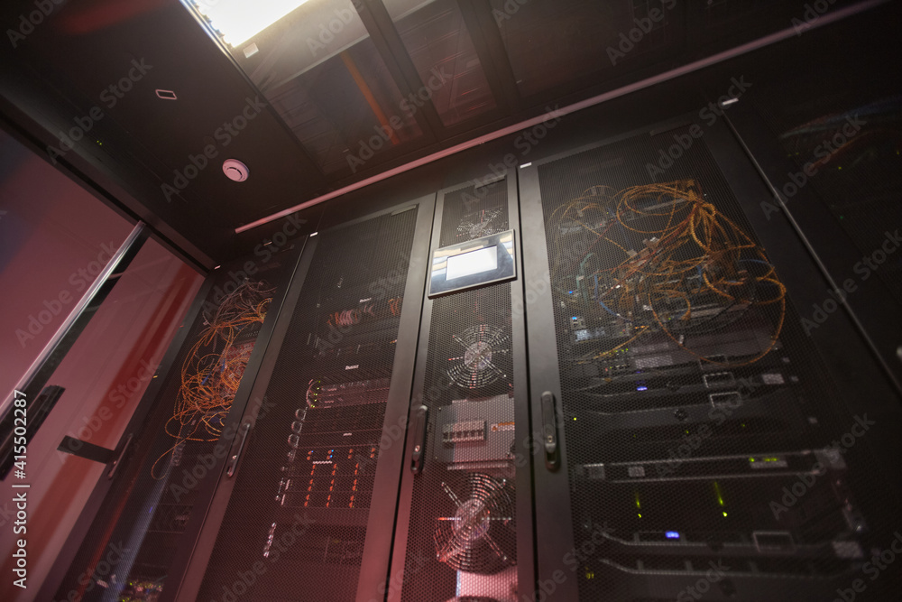 Low angle background image of rack server room in data center, copy ...