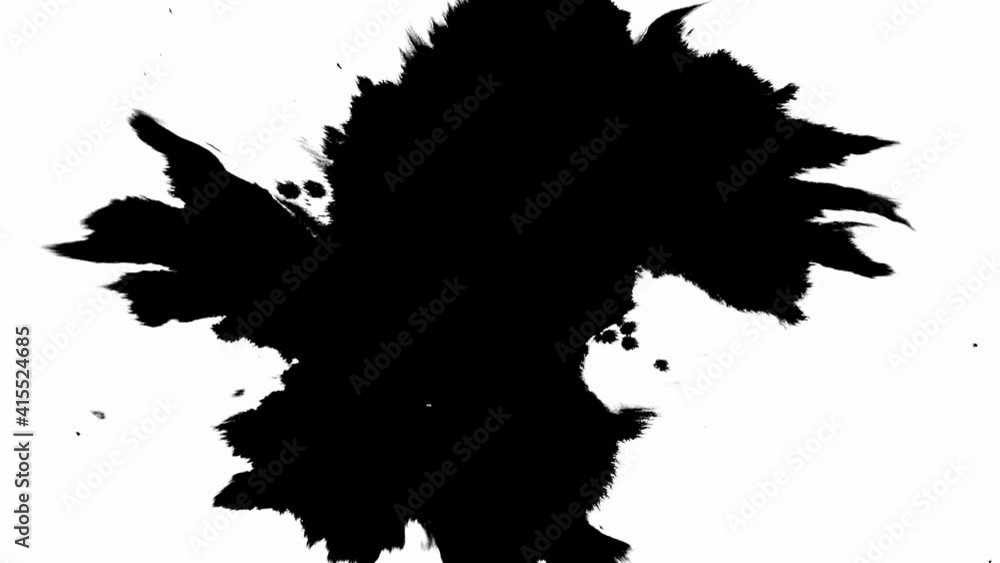 Black ink spills onto white paper, forming beautiful streaks. Beautiful ...